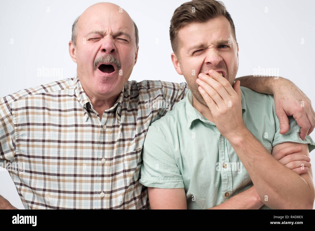 Father and son are tired of work Stock Photo - Alamy