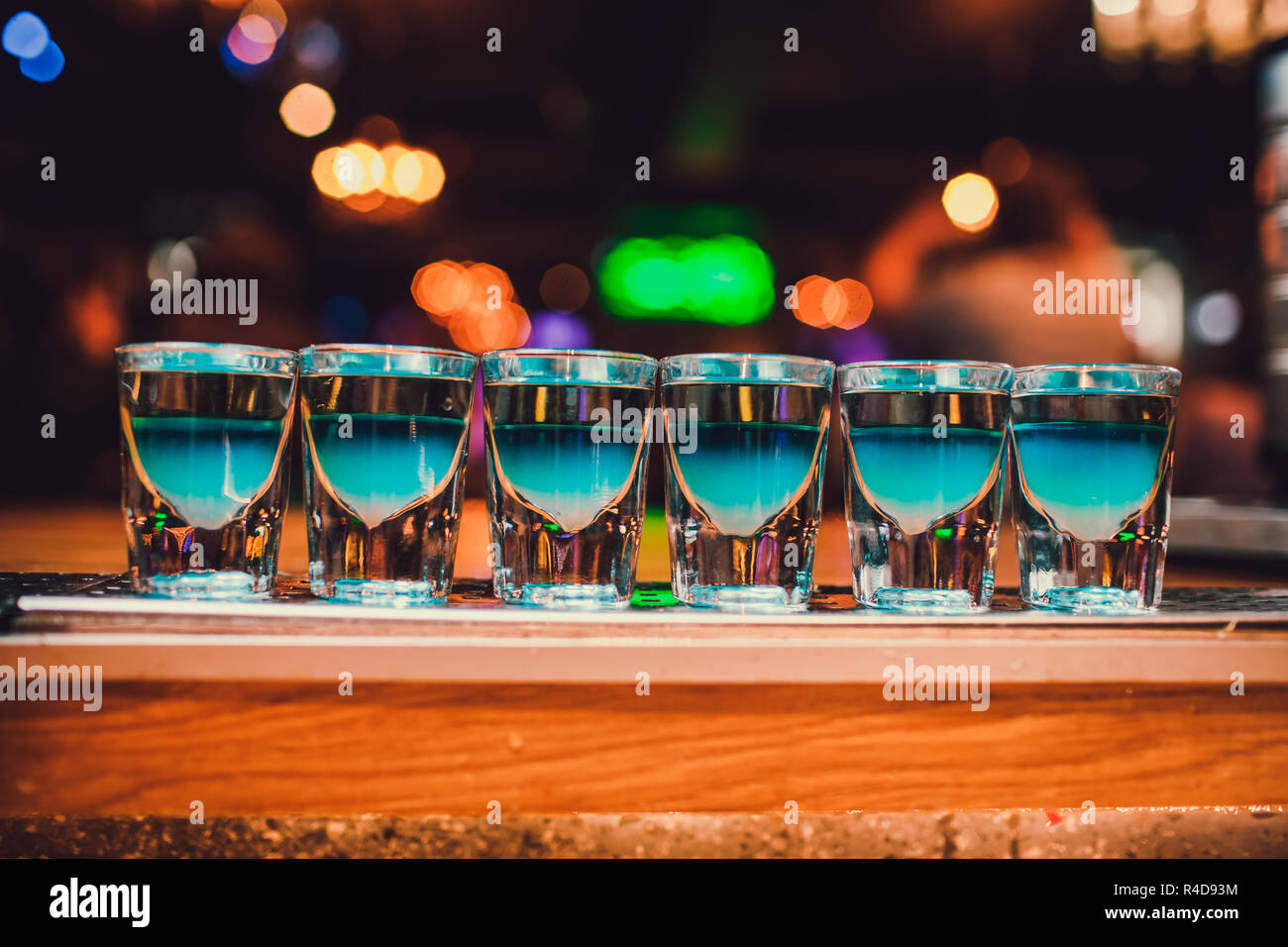 Cocktails at the club. Blue cocktails in the club. Set of cocktails on ...