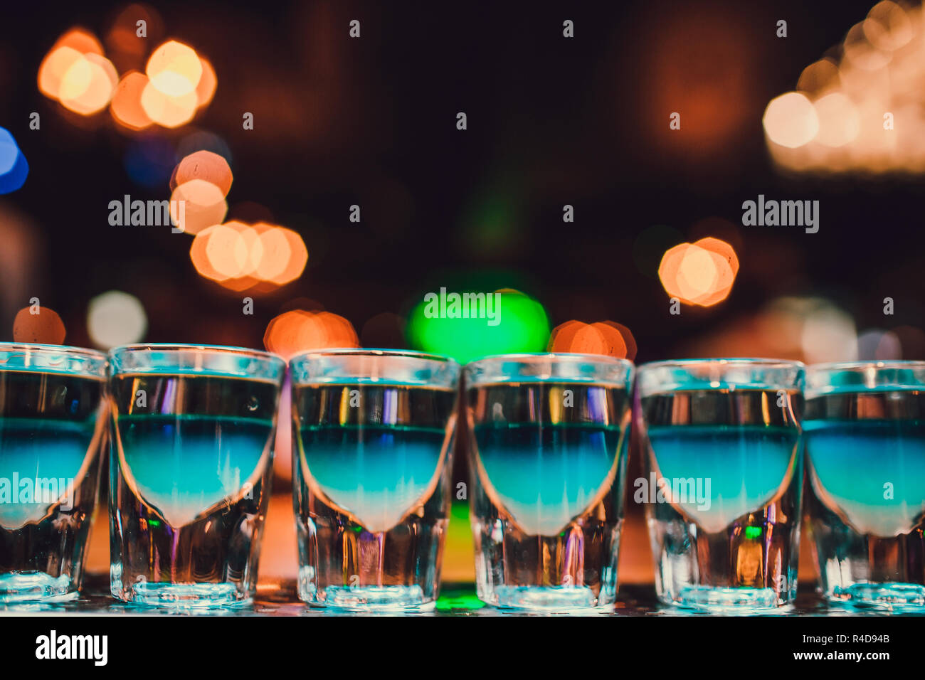 Cocktails at the club. Blue cocktails in the club. Set of cocktails on ...