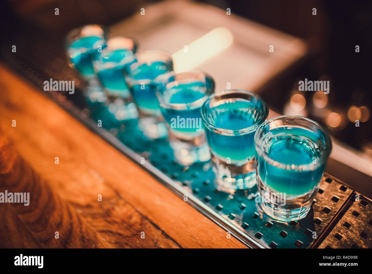 Cocktails at the club. Blue cocktails in the club. Set of cocktails on ...