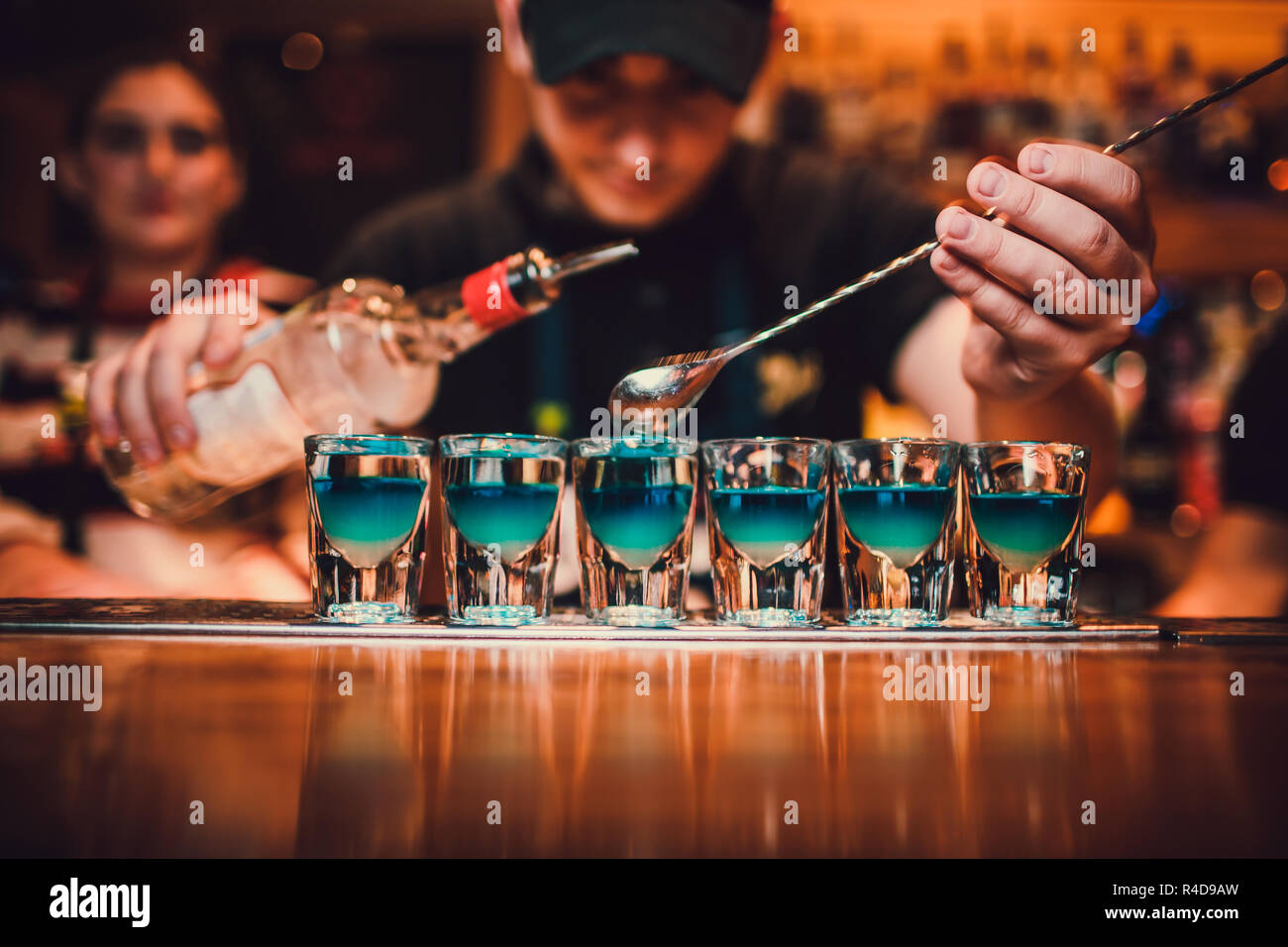 Cocktails at the club. Blue cocktails in the club. Set of cocktails on ...