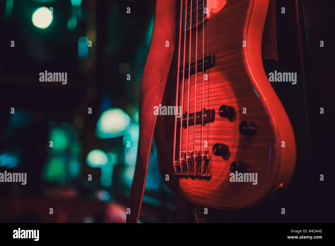 Red electric guitar and classic amplifier on a dark background Stock ...
