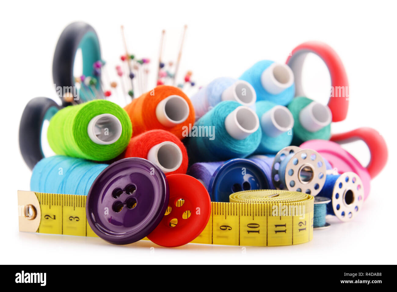 Composition with tailor threads isolated on white Stock Photo - Alamy
