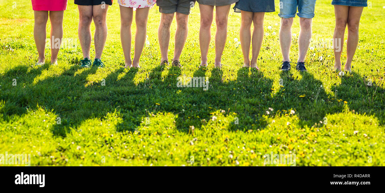 Legs of a group of people Stock Photo - Alamy
