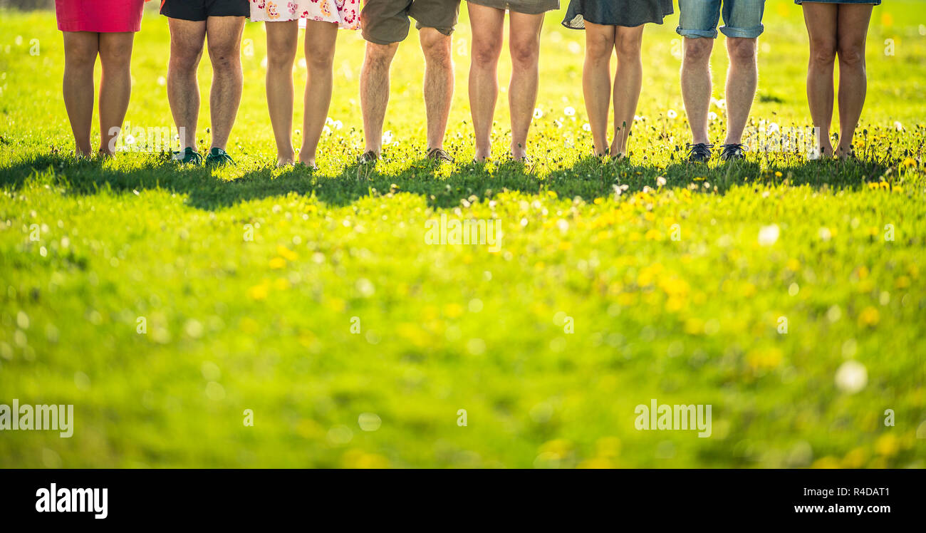Legs of a group of people Stock Photo - Alamy