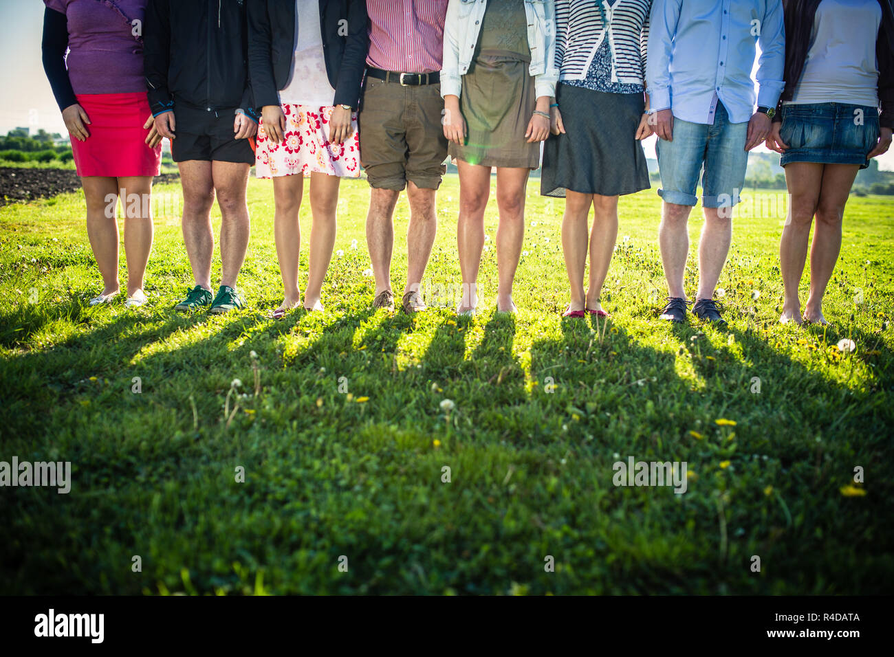 Legs of a group of people Stock Photo - Alamy