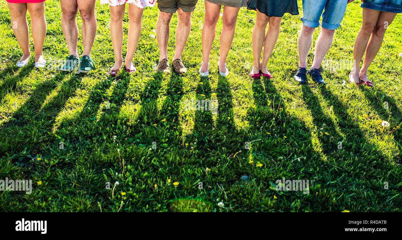 Legs of a group of people Stock Photo - Alamy