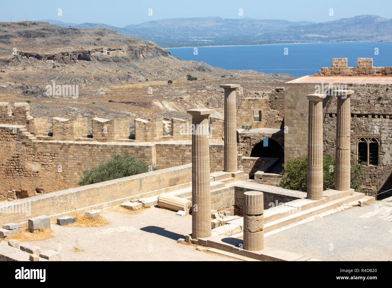 Ruins and columns of an ancient temple at the Acropolis of Lindos ...