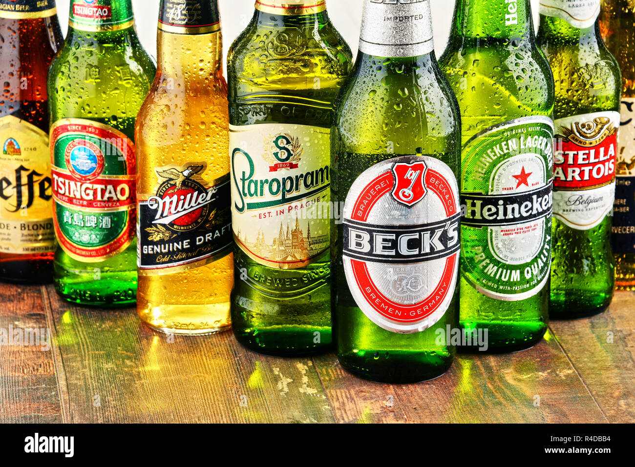 Bottles of assorted global beer brands Stock Photo - Alamy