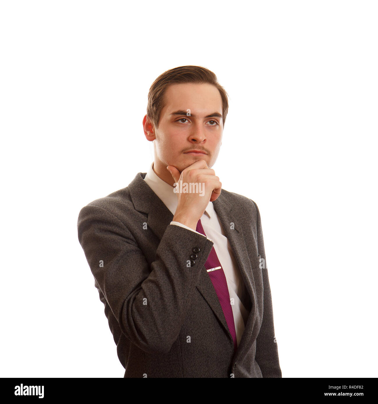 Thoughtful man in a suit Stock Photo - Alamy