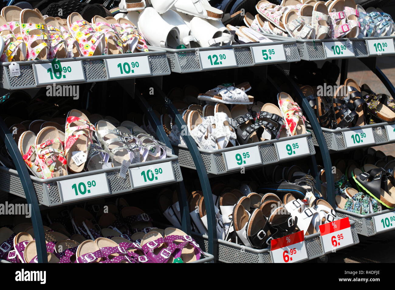 shoes in a shoe rack Stock Photo - Alamy