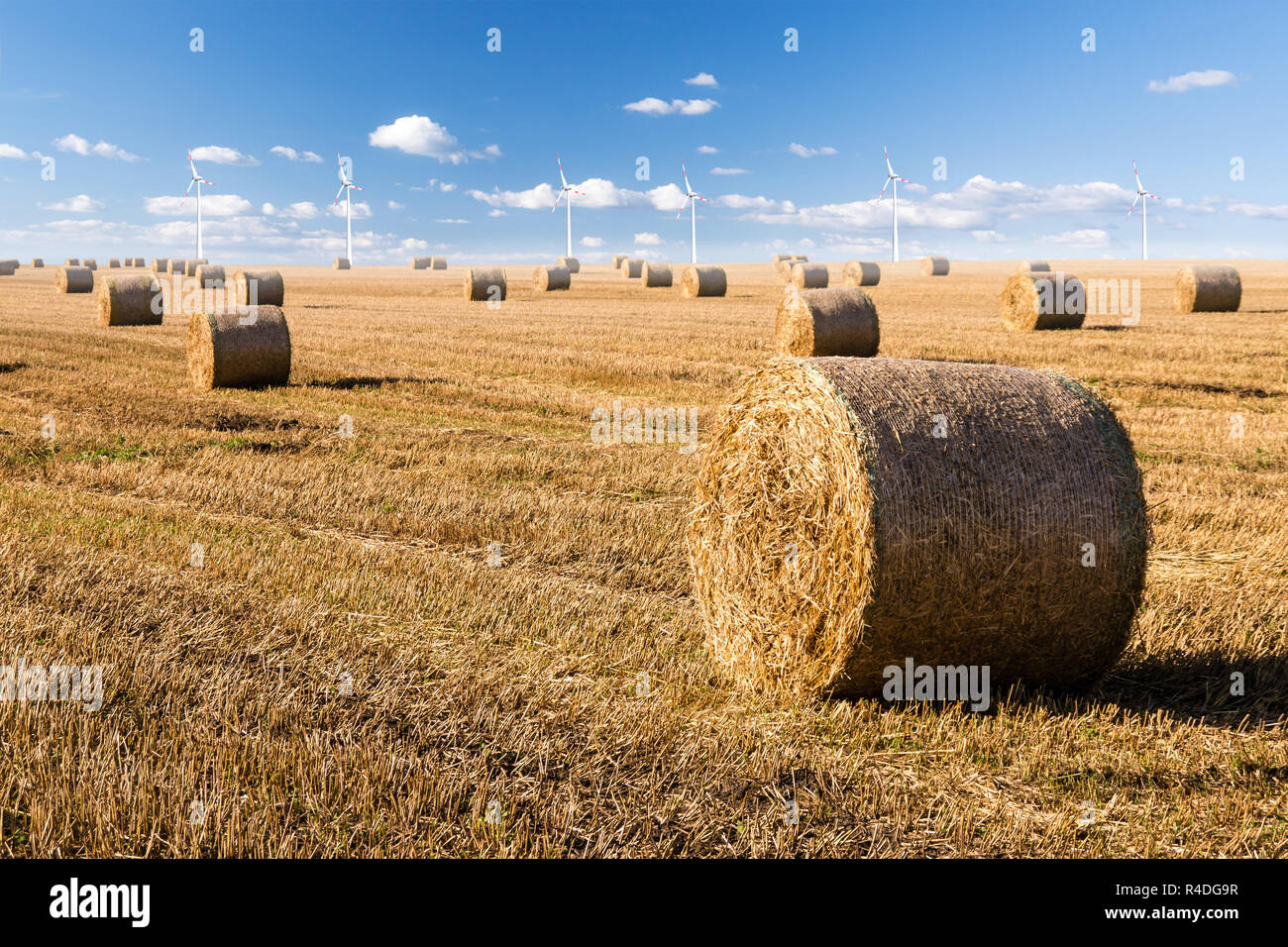 Straw bales and wind generator Stock Photo - Alamy
