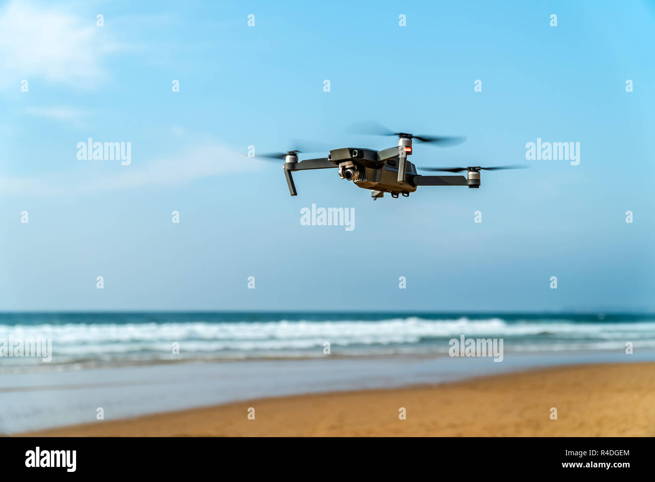 UAV Drone Quadcopter And Digital Camera Flying On Beach Stock Photo - Alamy