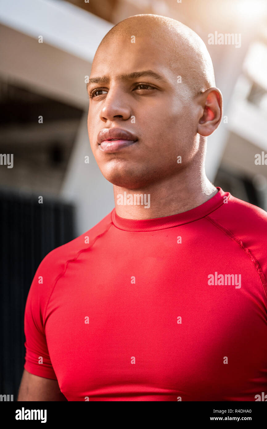 Portrait of a young handsome professional sportsman Stock Photo - Alamy