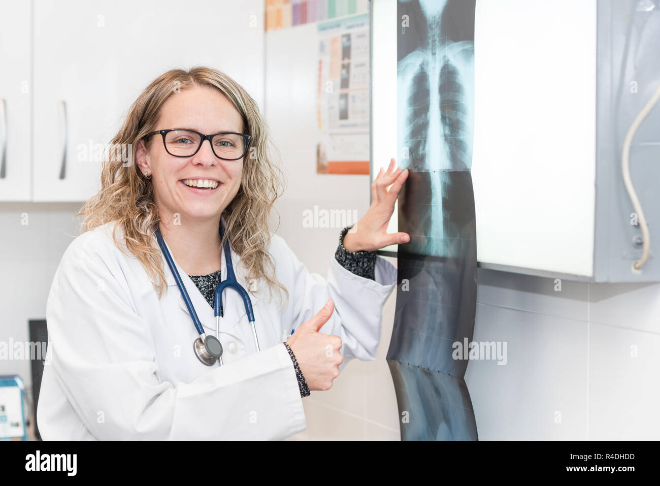 female Doctor examining a radiography Stock Photo - Alamy
