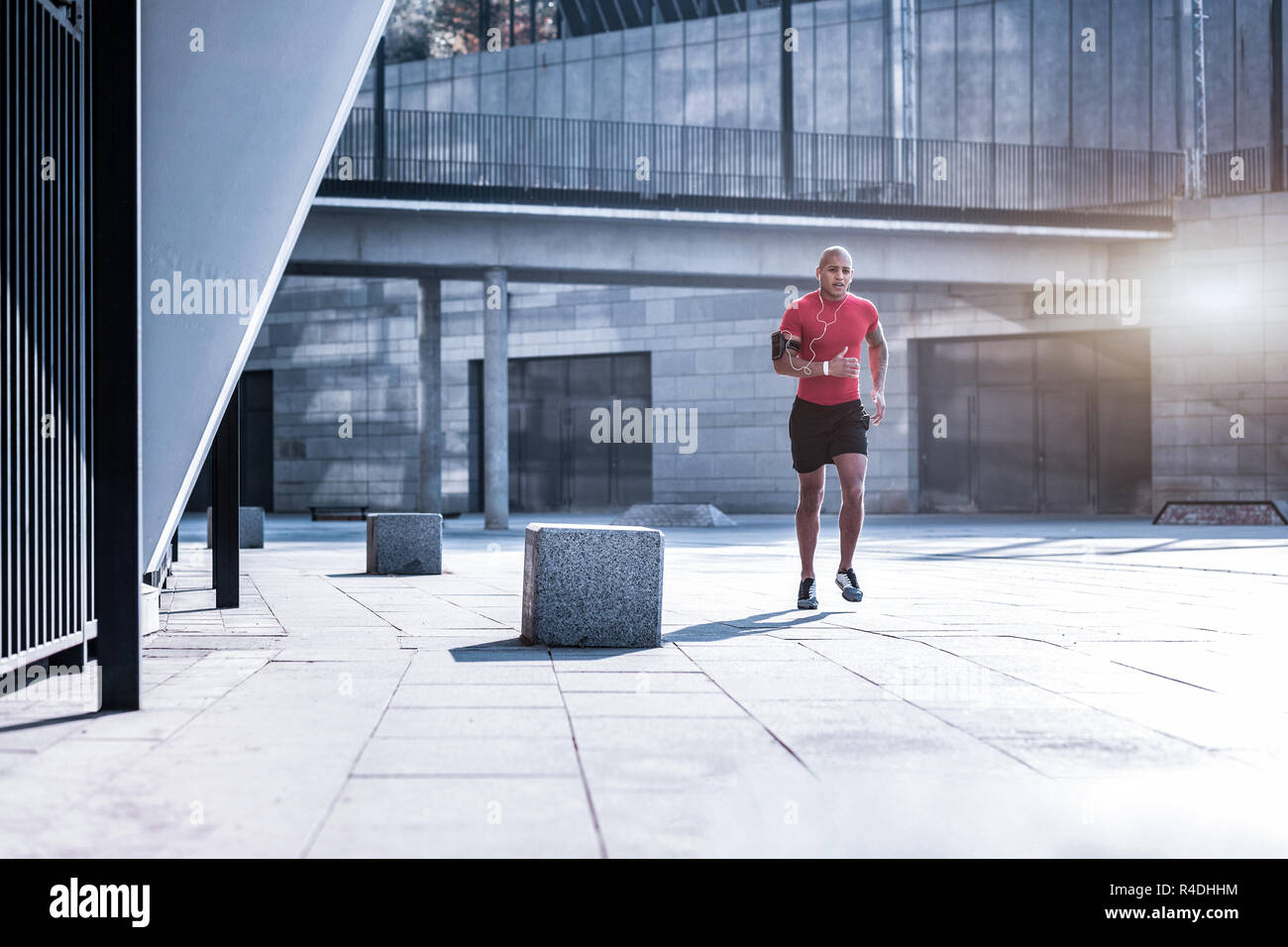 Man running headphones marathon hi-res stock photography and images - Alamy