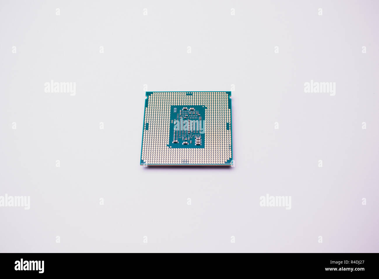 processor for computer isolated on a colored background Stock Photo - Alamy