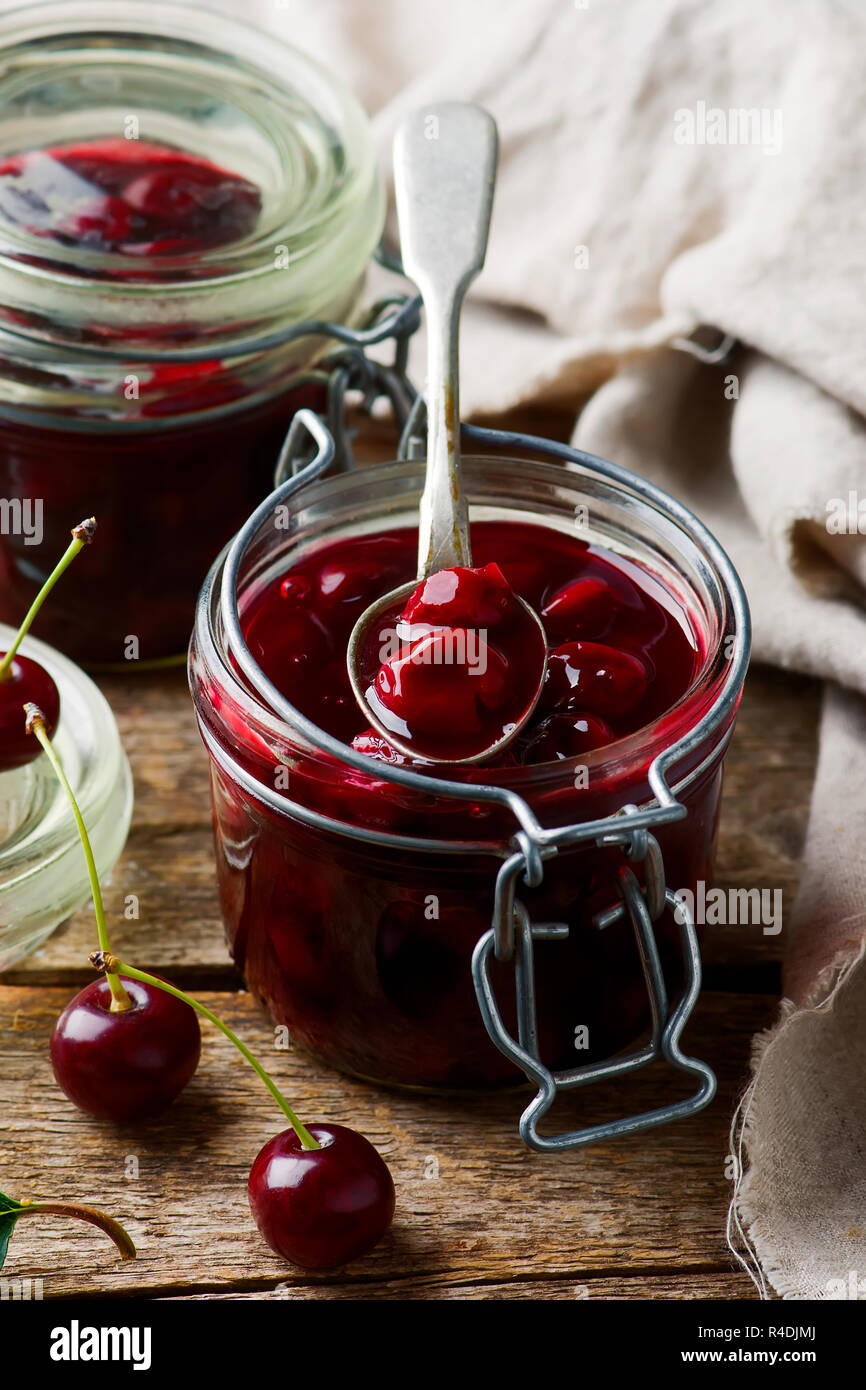 Homemade easy Cherry filling in to the jar style rustic.selective focus ...