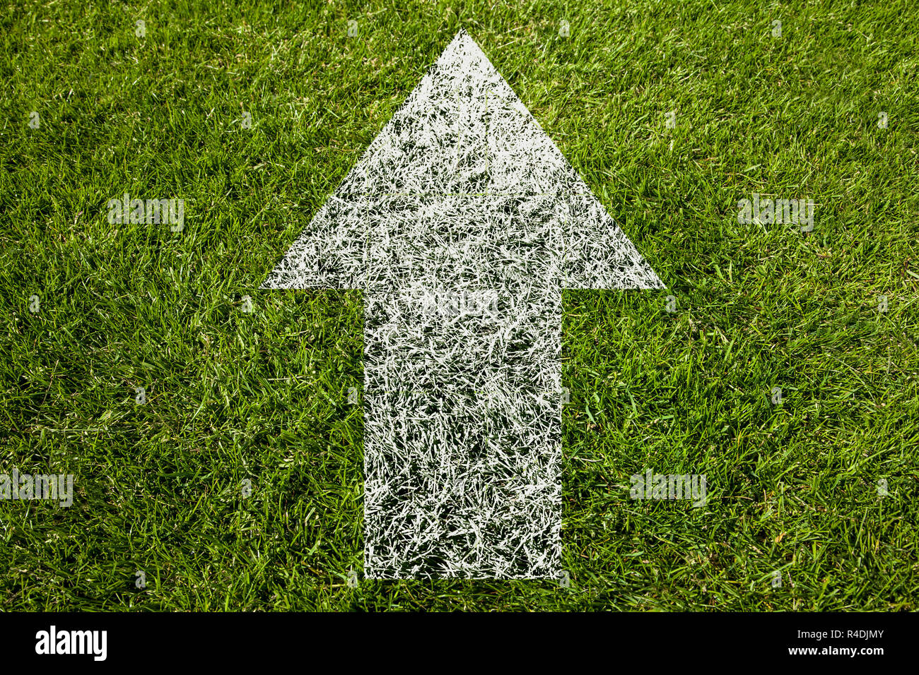 White Arrow On Ground Pointing High Resolution Stock Photography and ...