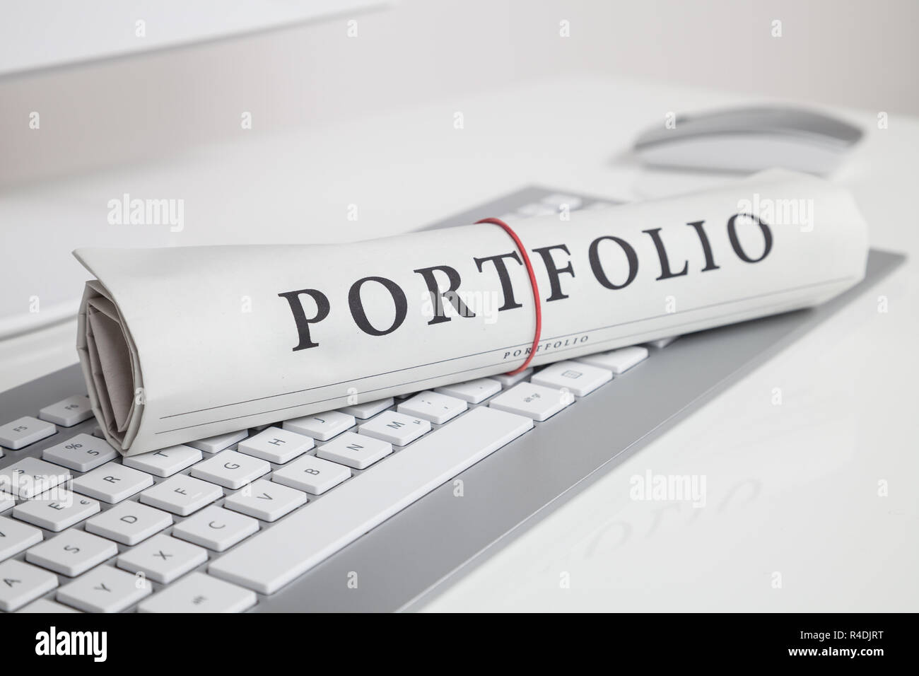 portfolio written on newspaper Stock Photo - Alamy
