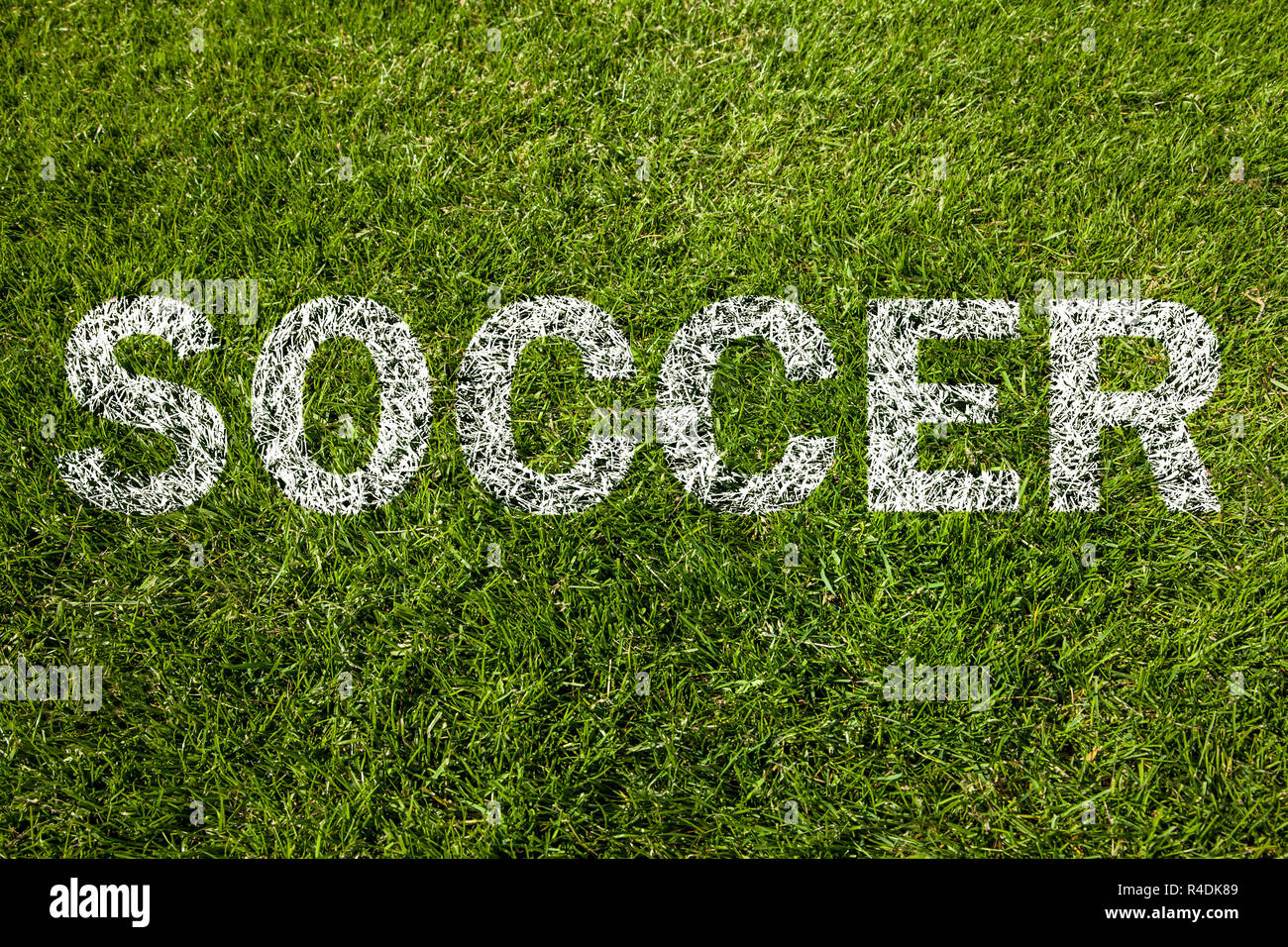 Soccer text written on hi-res stock photography and images - Alamy