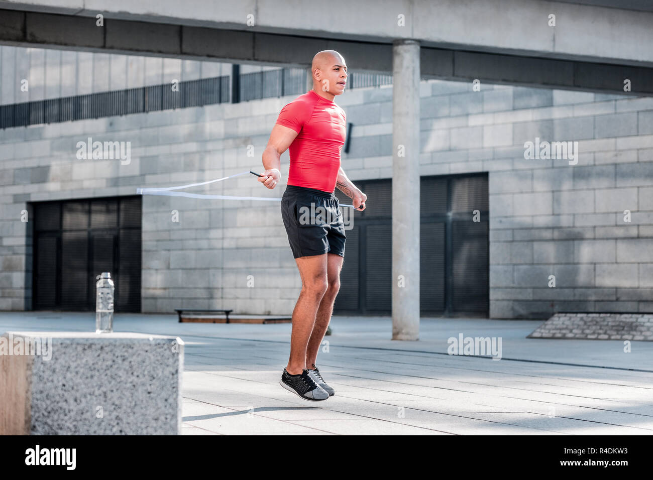 Multicultural man jumping hi-res stock photography and images - Alamy