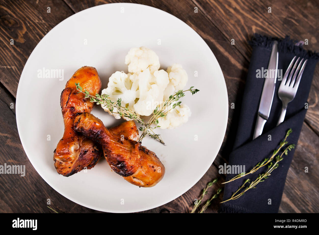 Cauliflower with chicken legs Stock Photo - Alamy