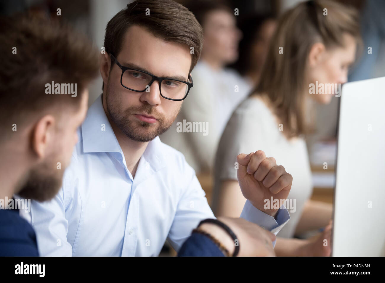 Employee listening hi-res stock photography and images - Alamy