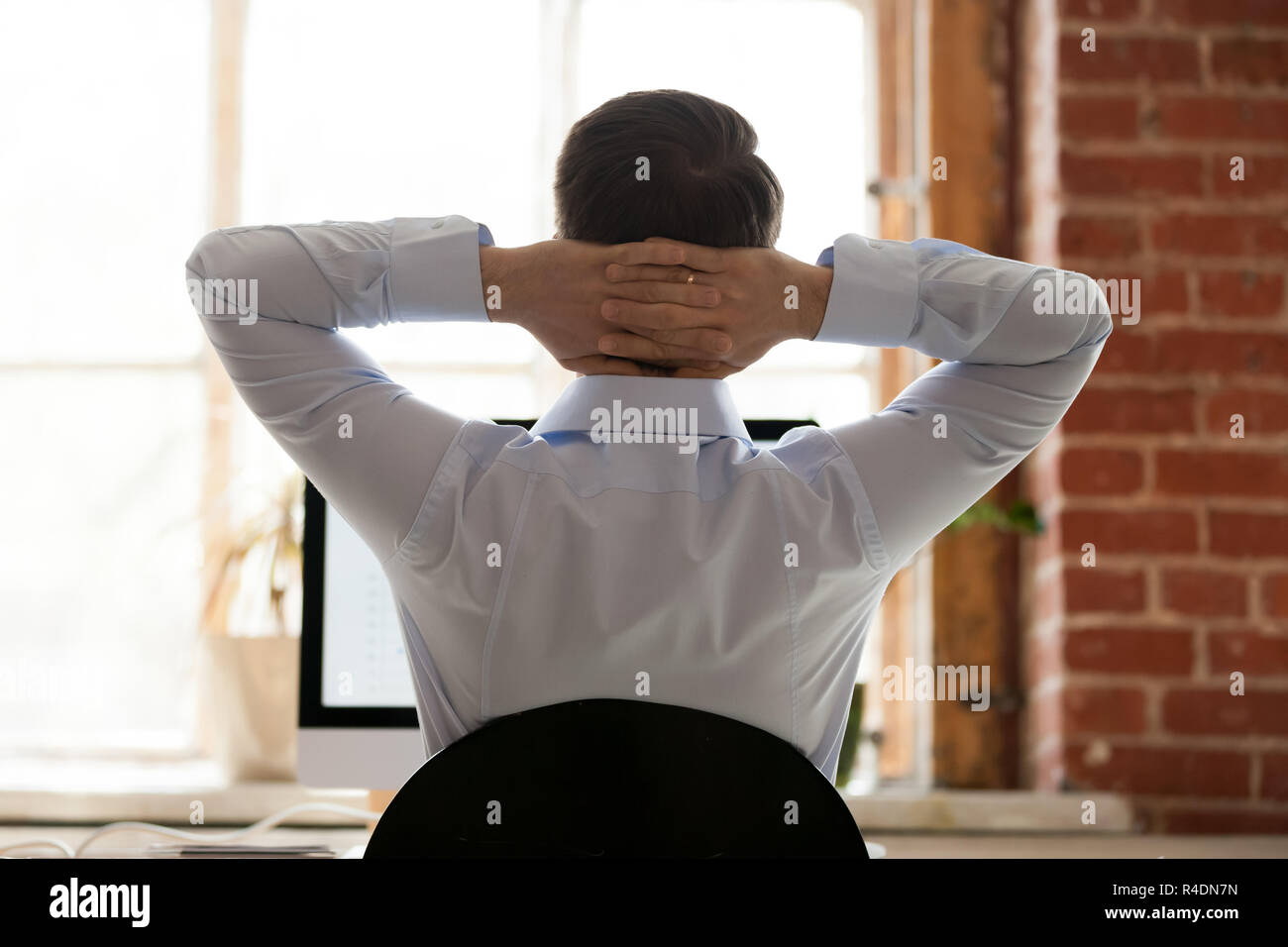 Businessman stretching office neck hi-res stock photography and images ...