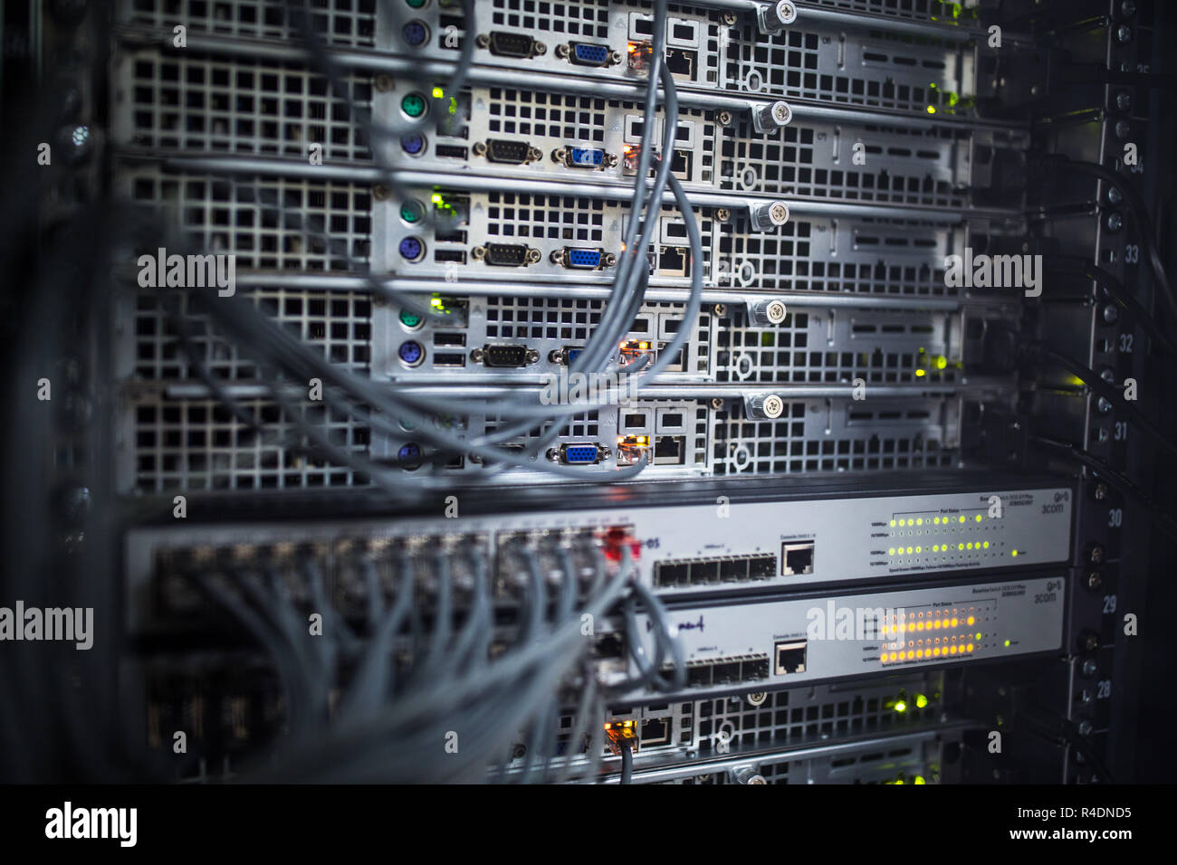 Server rack cluster in a data center (shallow DOF color toned image ...