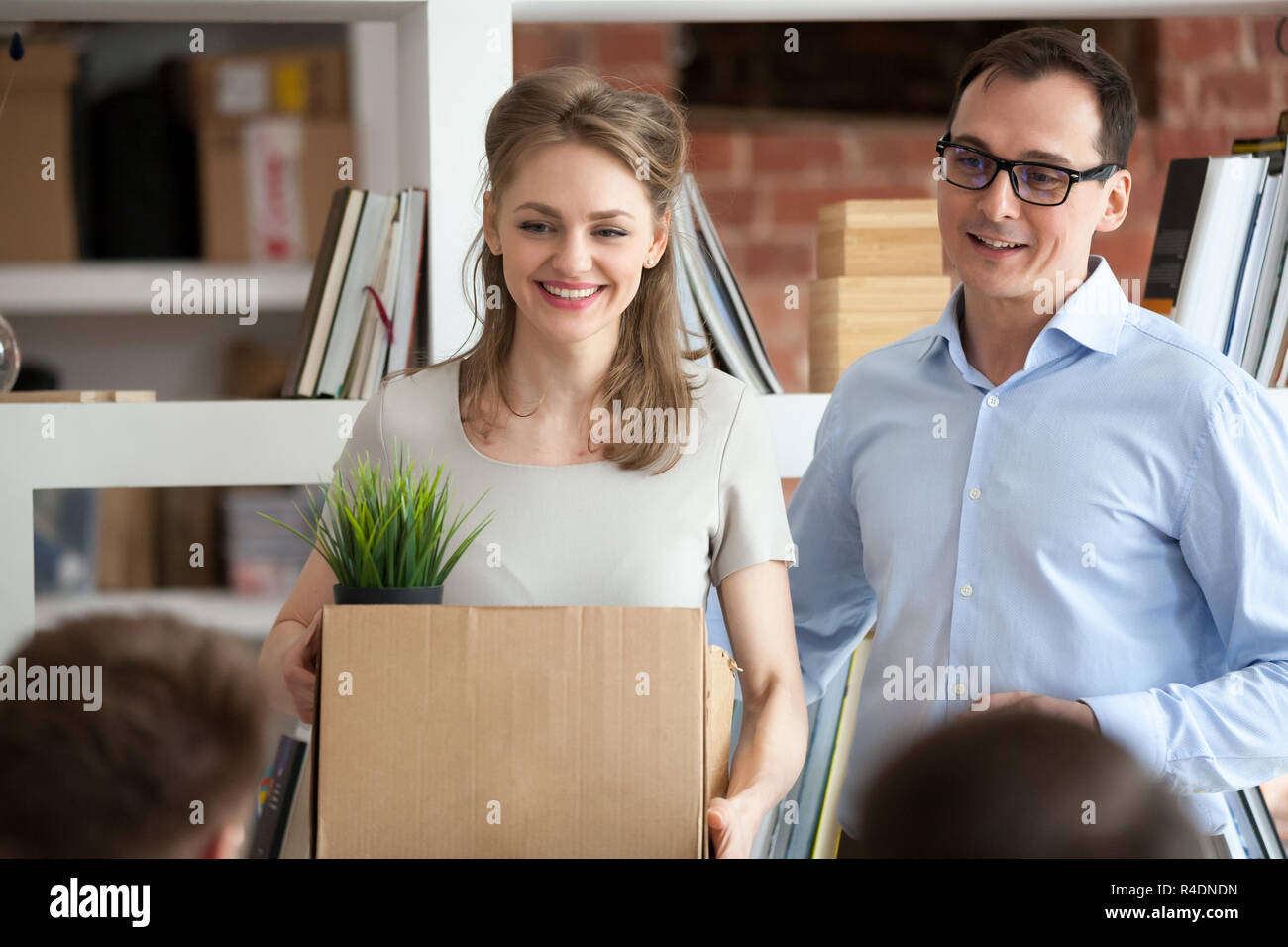 Company boss introducing new employee hi-res stock photography and ...