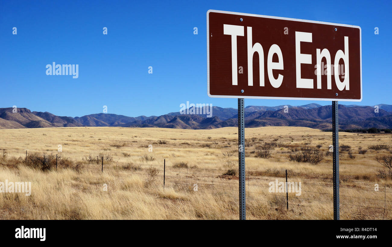 The End brown road sign Stock Photo - Alamy