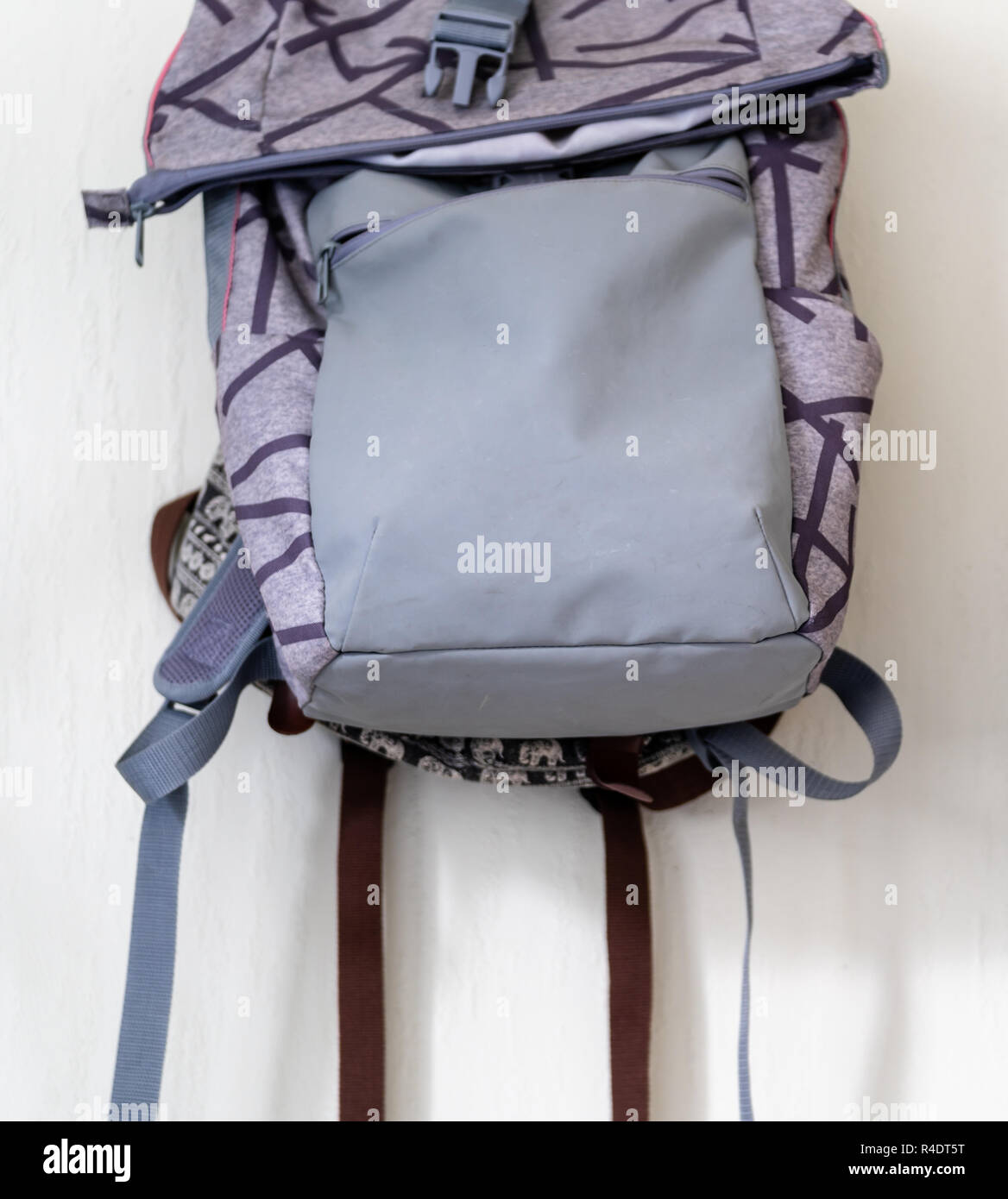 Purple School Backpack Hanging on the Wall - Isolated Object with White ...