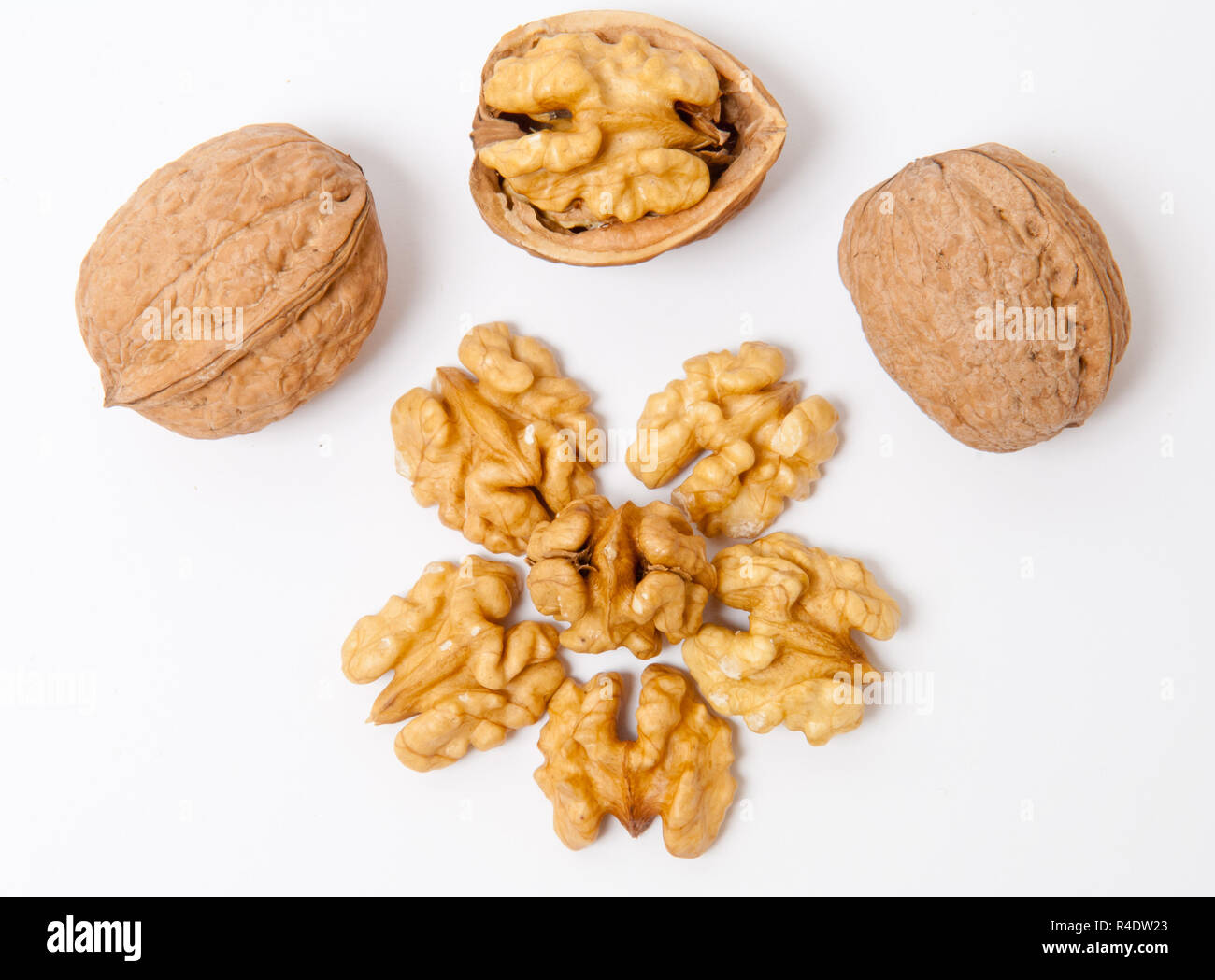 Pile of walnuts on white background Stock Photo - Alamy