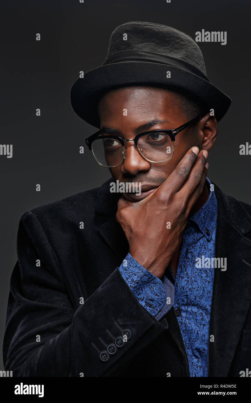 The thinking black man Stock Photo - Alamy