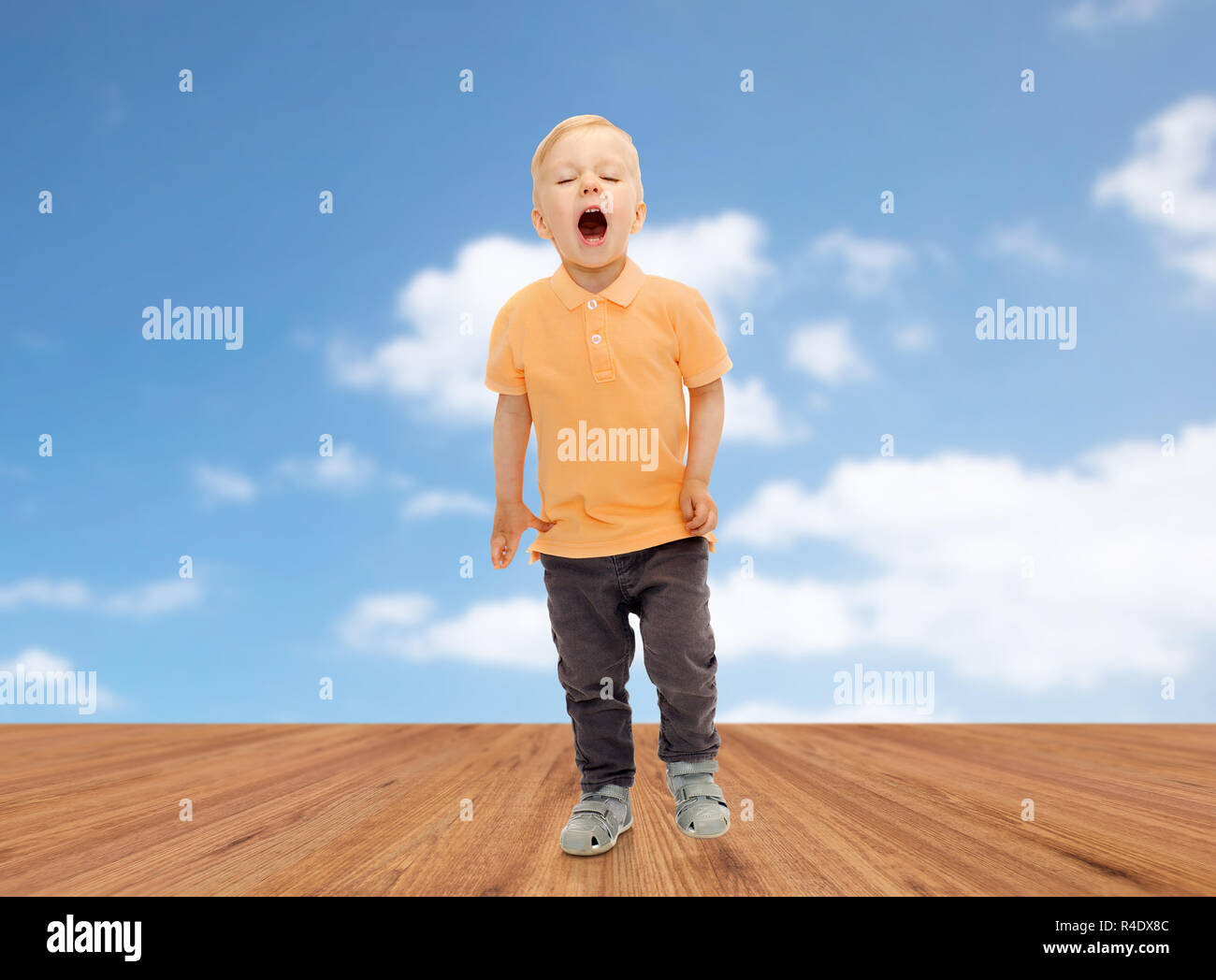 happy little boy shouting or sneezing Stock Photo - Alamy