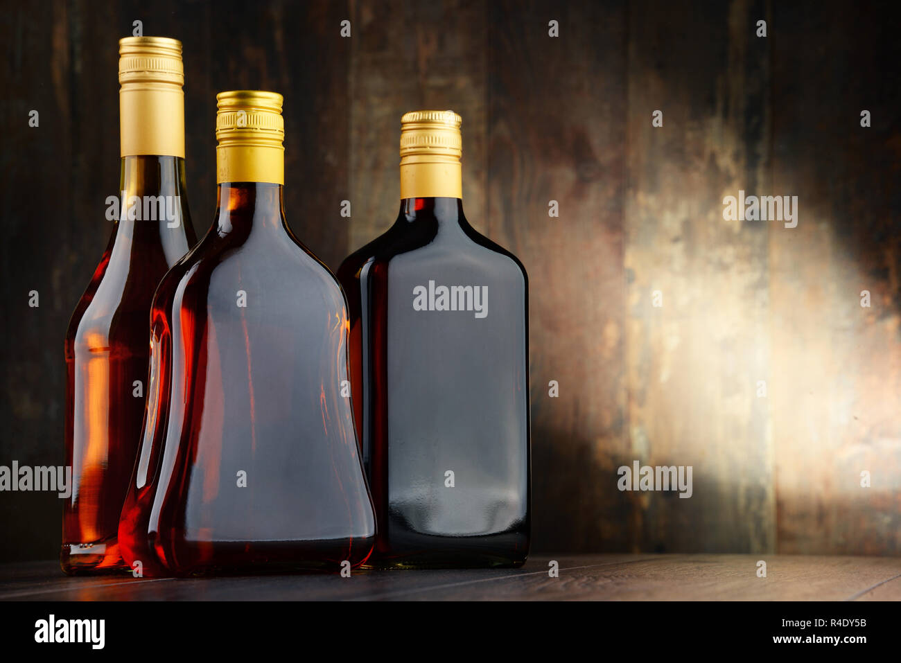 Bottles of assorted alcoholic beverages Stock Photo - Alamy