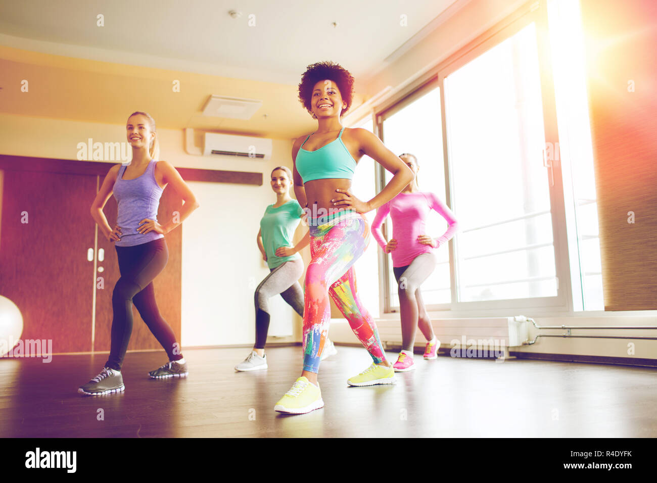 group of happy women working out in gym Stock Photo - Alamy