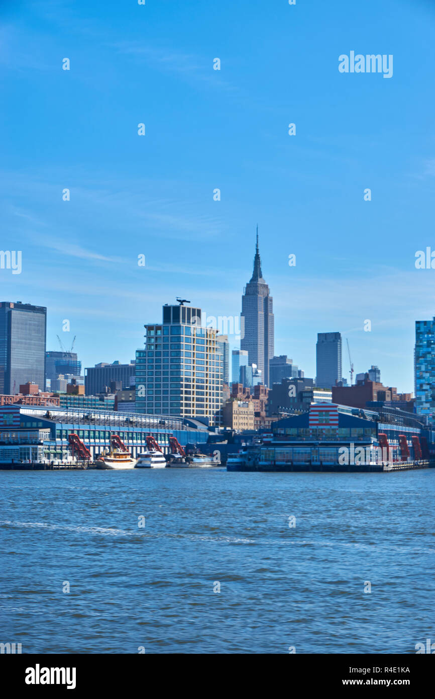 New York City skyline, a blue sky and water Stock Photo - Alamy