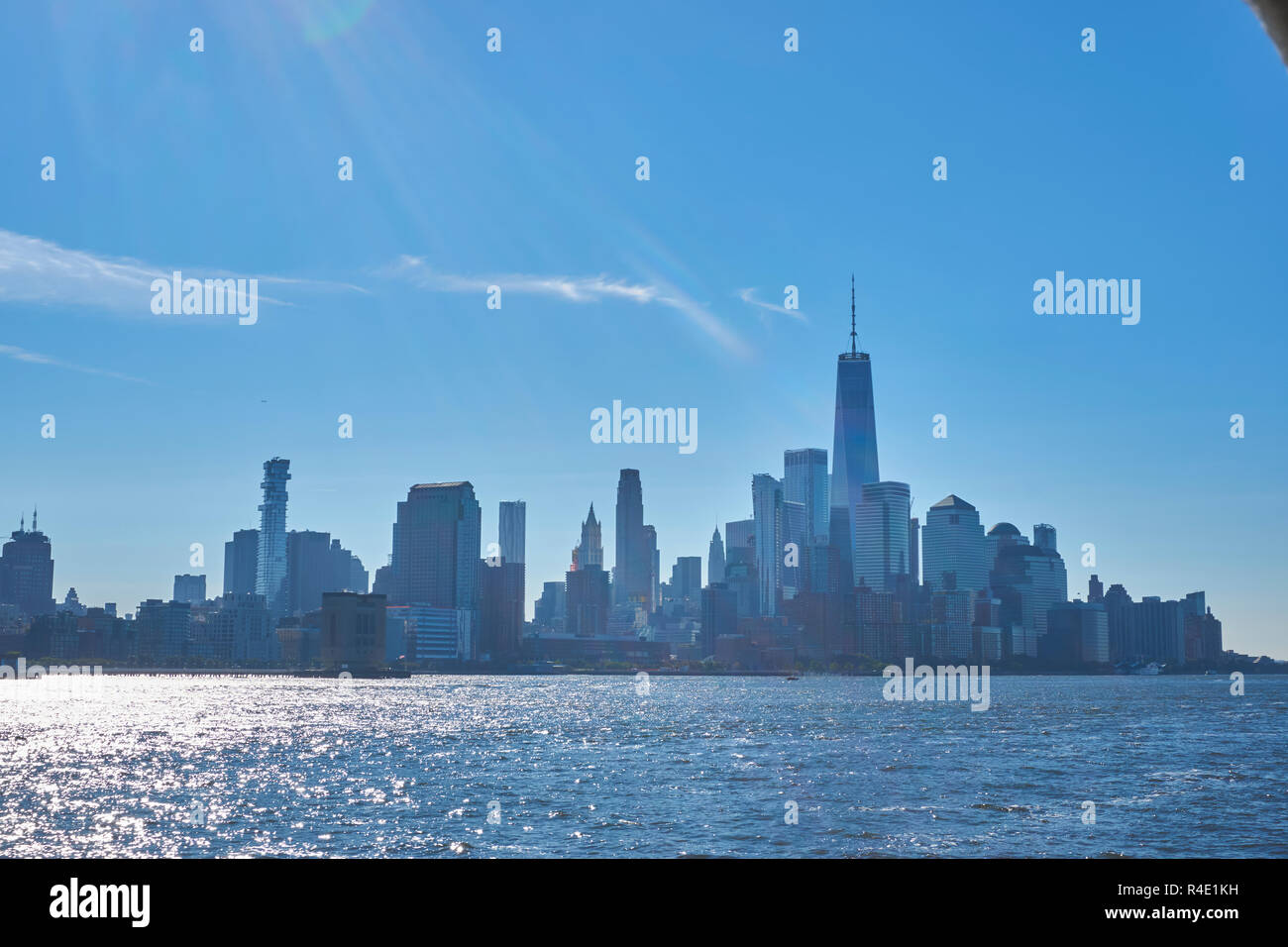 New York City skyline, a blue sky and water Stock Photo - Alamy