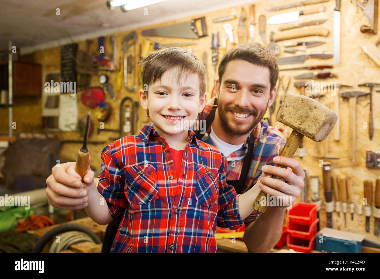 Father son hammer working workshop hi-res stock photography and images ...