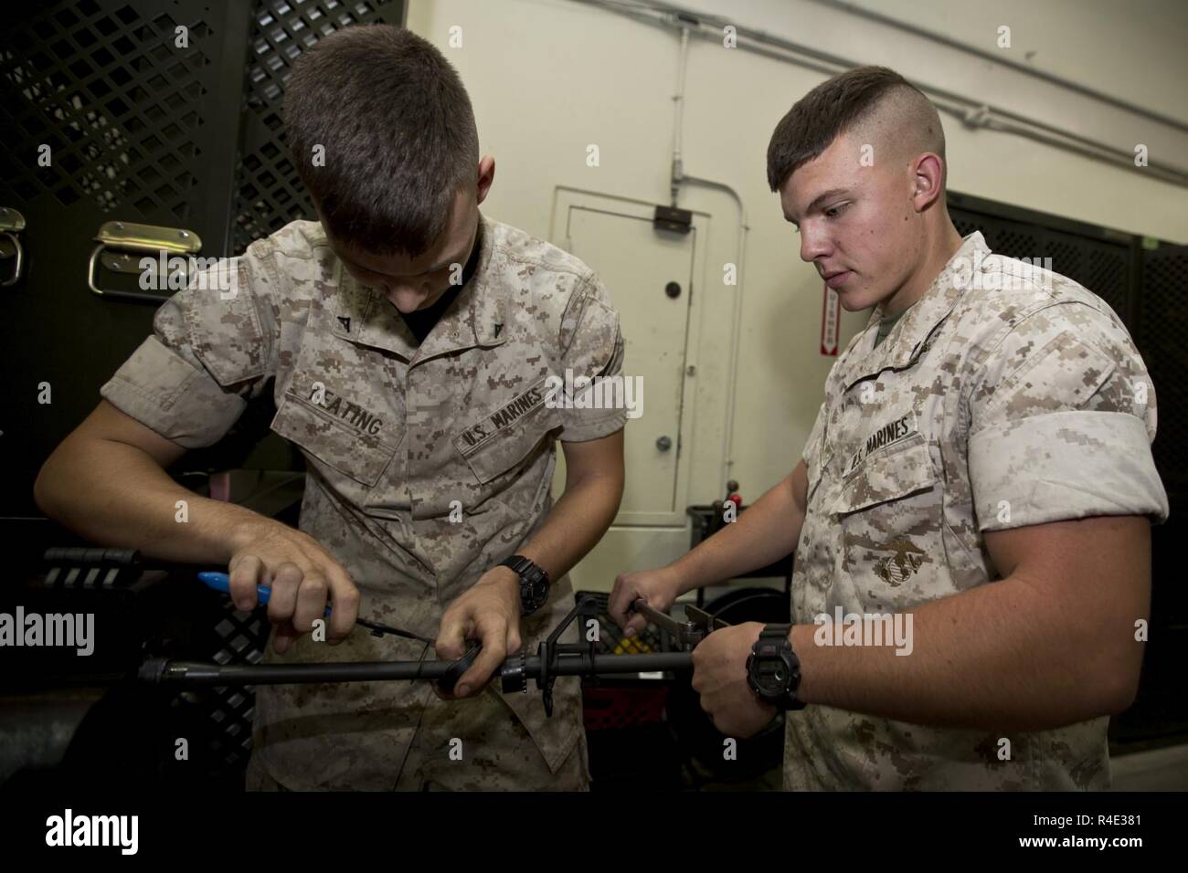 U.S. Marine Corps Lance Cpl. Kelly R. Keating, left, and Lance Cpl ...
