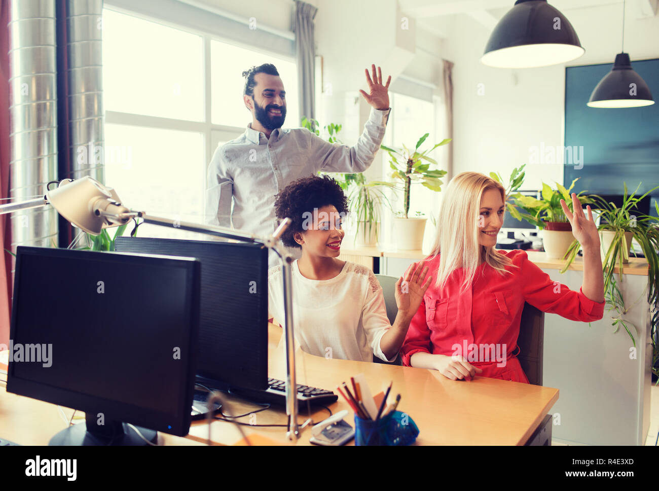 Younger Man Waving High Resolution Stock Photography and Images - Alamy
