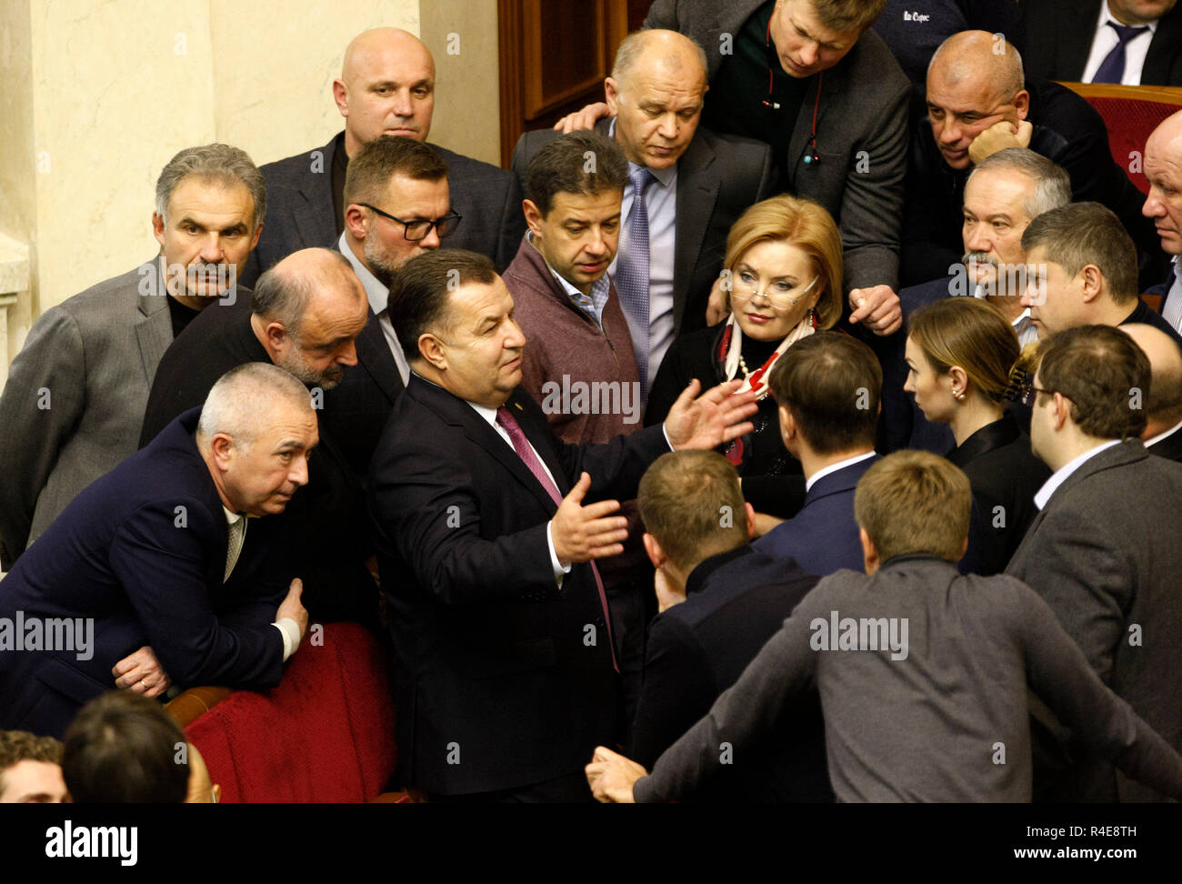 Ukrainian Defense Minister Stepan Poltorak (C) speaks with lawmakers ...