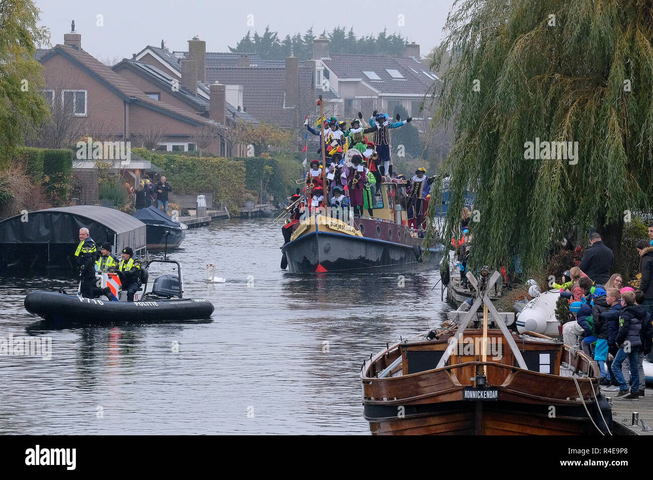 People dressed as traditional characters known as Zwarte Piet or Black ...