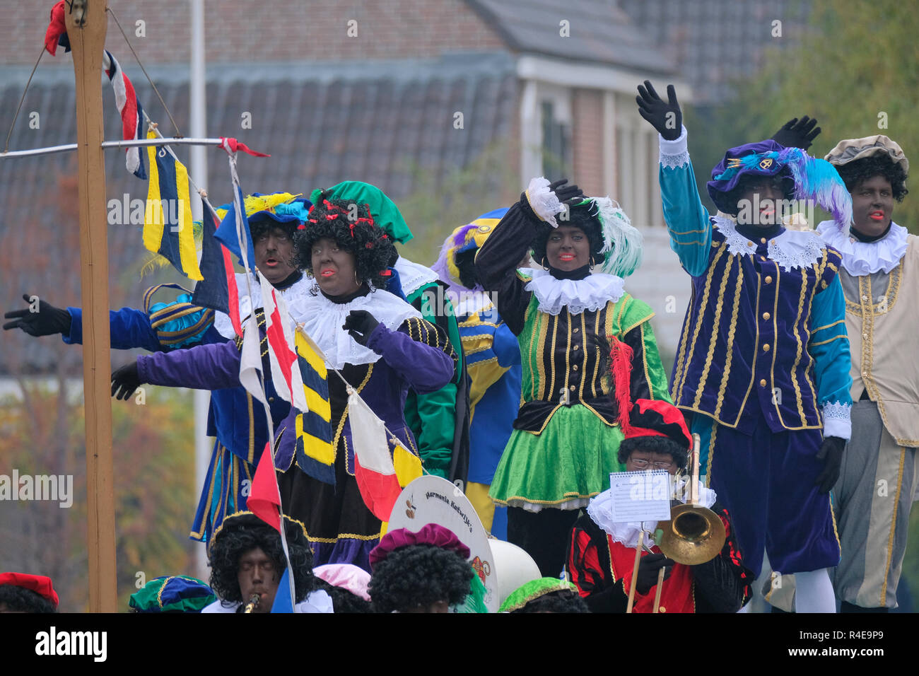 People dressed as traditional characters known as Zwarte Piet or Black ...