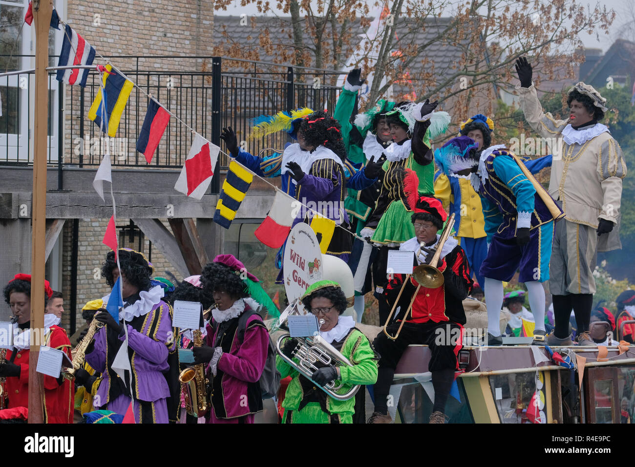 People dressed as traditional characters known as Zwarte Piet or Black ...
