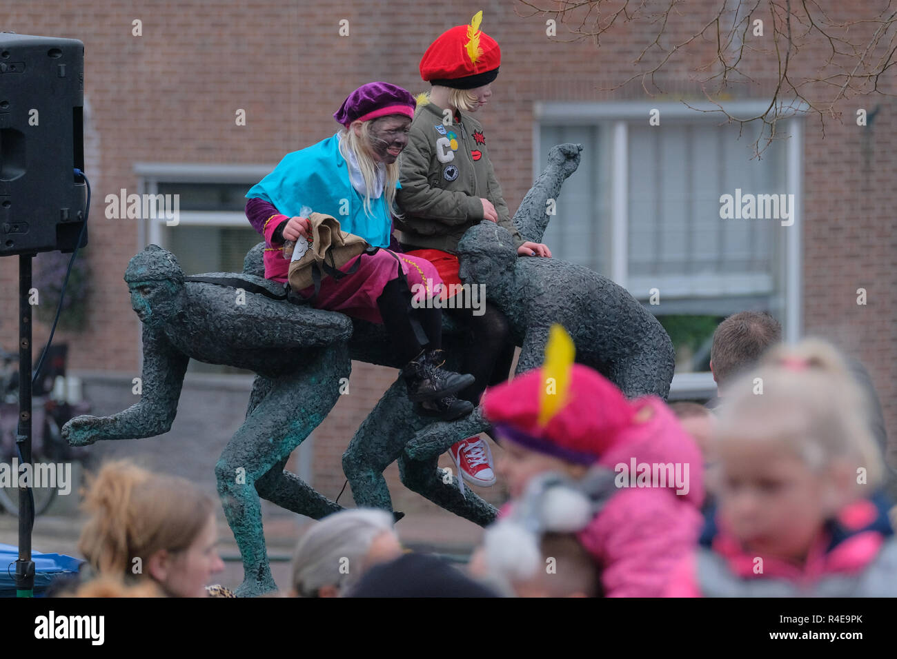 Girls dressed as traditional characters known as Zwarte Piet or Black ...