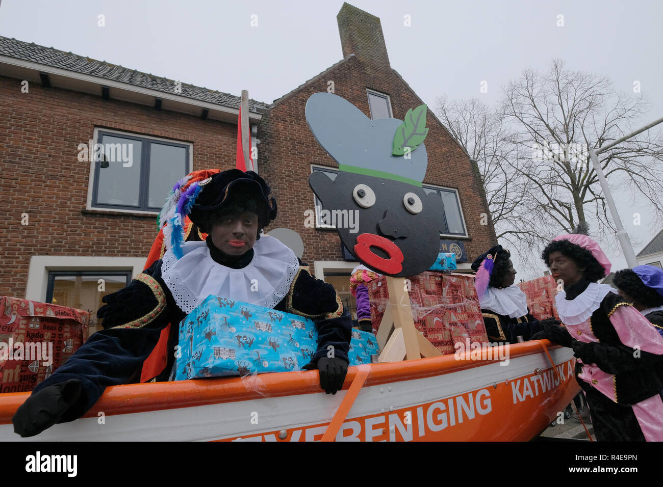 People dressed as traditional characters known as Zwarte Piet or Black ...