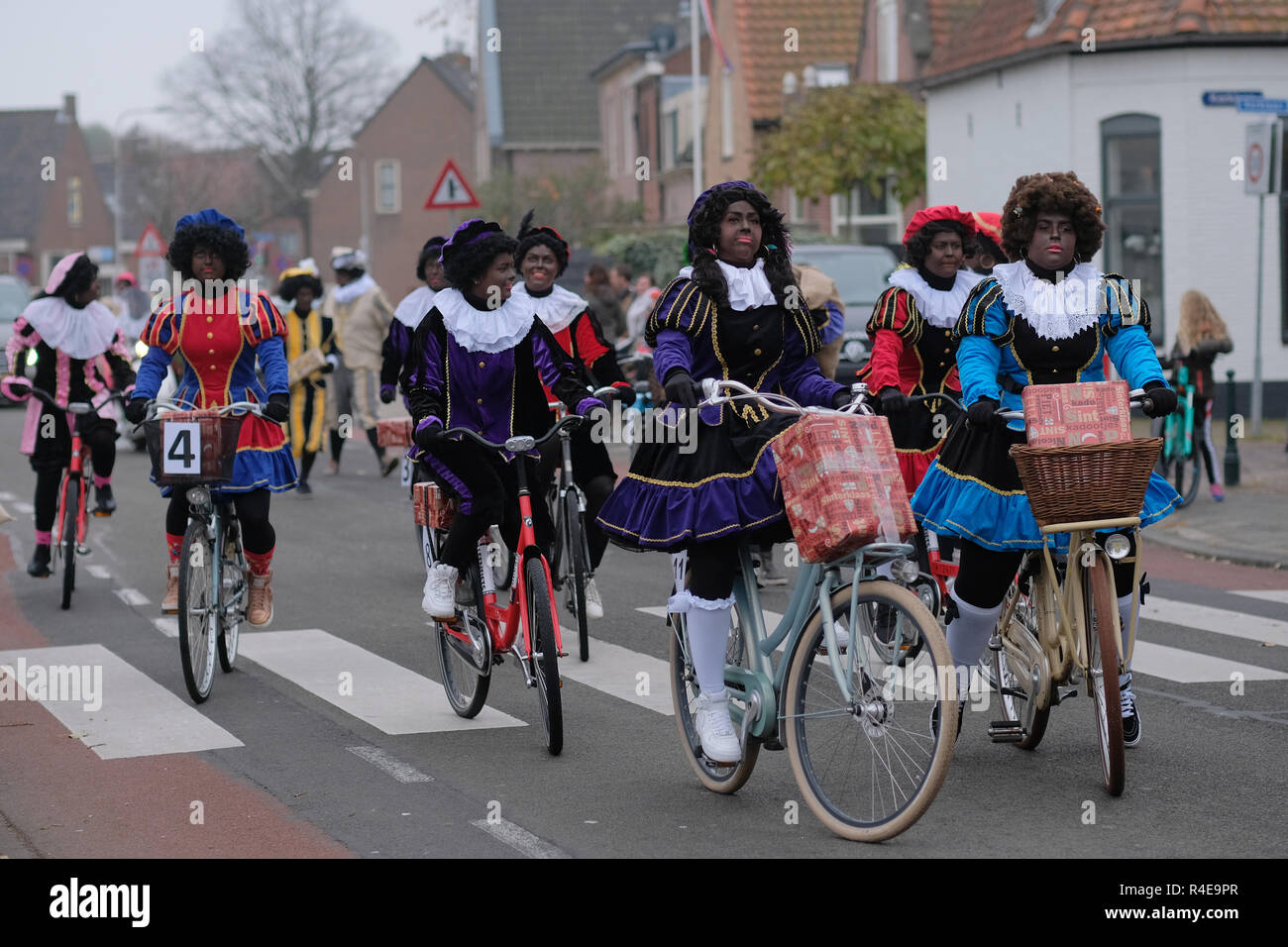 People dressed as traditional characters known as Zwarte Piet or Black ...